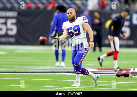 Buffalo Bills long snapper Reid Ferguson (69) and Miami Dolphins long ...