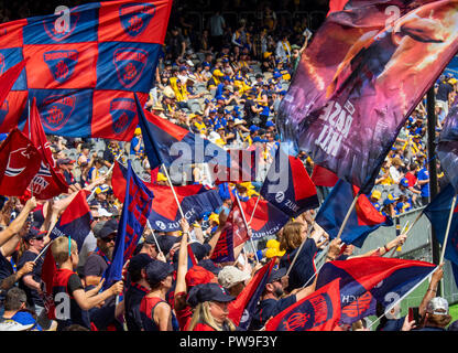 Football fans waving Melbourne Football club flag at 2021 AFL Grand ...