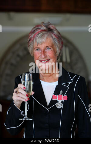 Hazel Latus, Chief Executive of a charity pictured receiving her ...