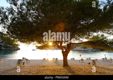 Sunset on the beach Cala Galdana Menorca Stock Photo - Alamy