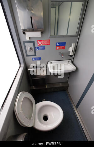 Public restroom sink and toilet onboard a ferry in Norway Stock Photo ...