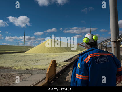 Sulfur piles storage at the PAO Gazprom factory in Astrakhan, Russia ...