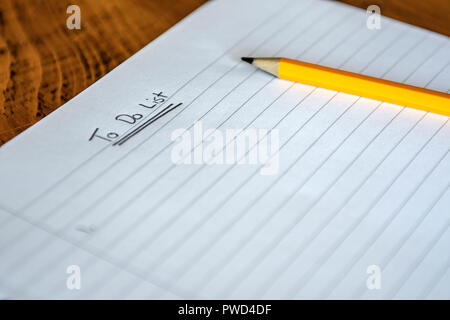Pencil and Paper. Blank note pad awaiting ideas Stock Photo - Alamy