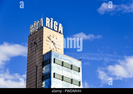 Clock tower in Riga city center, Latvia Stock Photo - Alamy