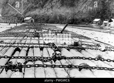 Built Benson log raft with chains Stock Photo - Alamy
