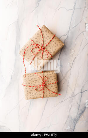 Packed gift box on vintage wooden board holiday concept Stock Photo - Alamy