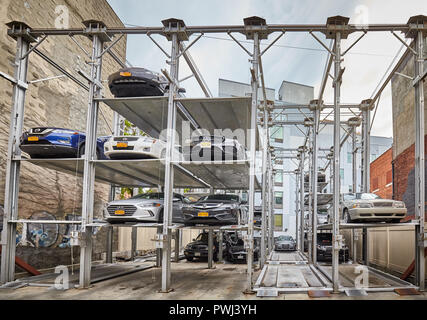 Car stack parking in New York saves space but can take longer to ...