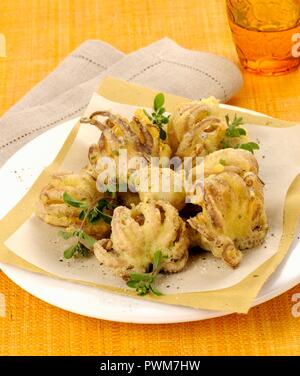 Fried fish on paper plates Stock Photo - Alamy