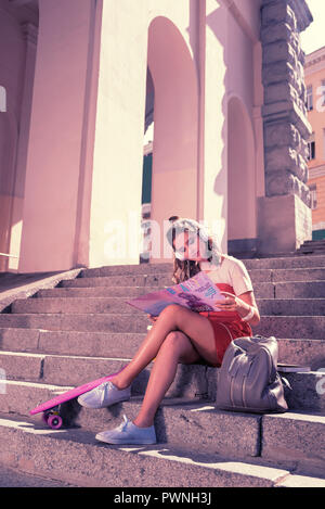 Girl waiting for a friend Stock Photo - Alamy