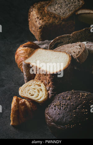 Variety of fresh baked rye, spelled, wheat craft artisan bread, whole ...