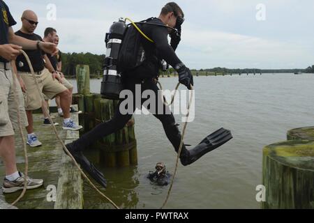 U.S. Army Second Class Diver with the 511th Engineer Dive Detachment ...