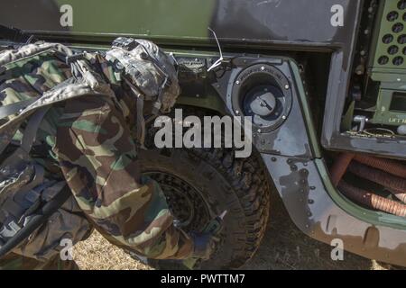 U.S. Army Spc. Justin Farfan assembles a Joint Chemical Agent Detector ...