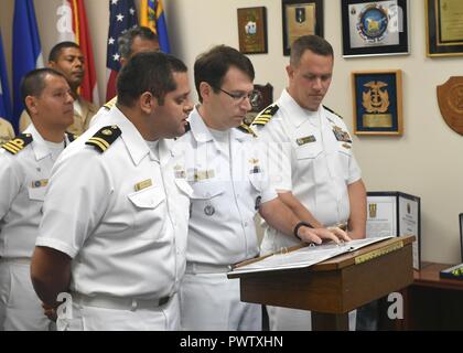 U.S. Navy Lt. Cmdr. Jose Gomez, right, and Hellenic navy Chief Petty ...