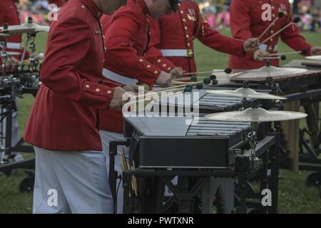 A US Marine Drum & Bugle Corps bugler plays taps during a Stock Photo ...
