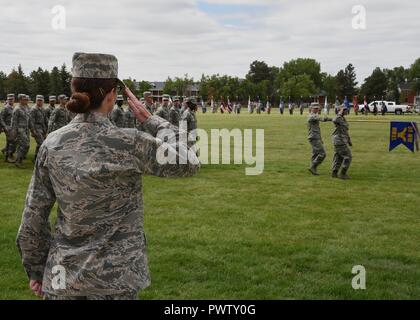Colonel Stacy Huser, 90th Missile Wing commander, returns the first ...