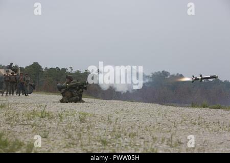 US Marines fire a TOW Missile from an M-41 Saber weapon system during ...