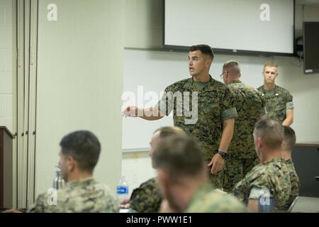 U.S. Marine Corps Captain Justin M. Carrasco, logistics officer, with ...