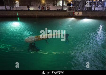 Naval submarine submerge underwater during a mission in open sea Stock ...