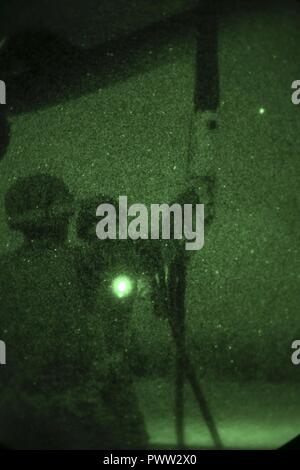 U.S. Marine Lance Cpl. Jess Barrett, a heavy equipment operator with ...