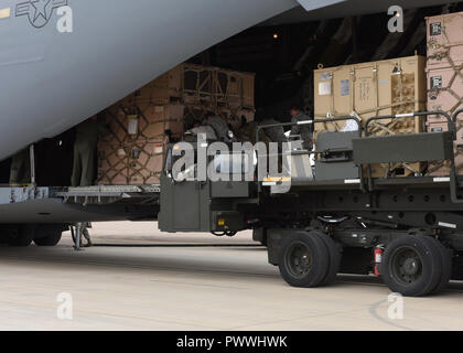 49th Aircraft Maintenance squadron Airmen attach an engine cover panel ...