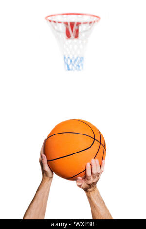 portrait of the arms of a basketball player intent on shooting the ...