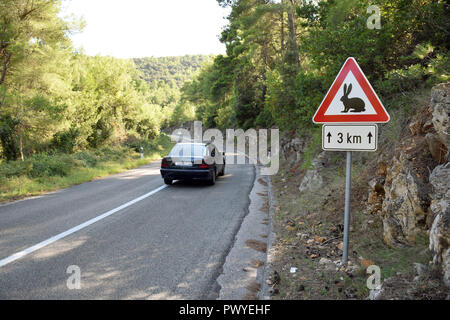 Rabbit warning road sign, Korcula island, Croatia, Sep 2018 Stock Photo ...