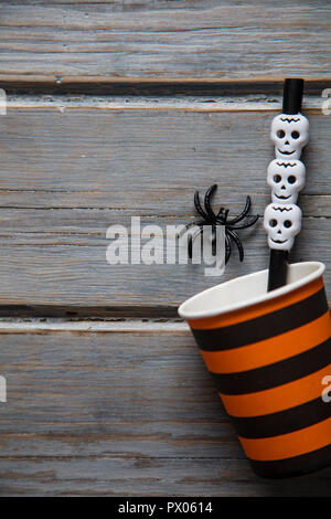 Halloween paper decorations on wooden background Stock Photo - Alamy
