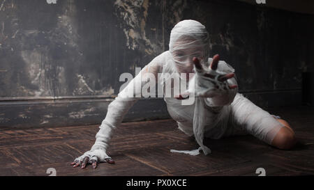 Scary mummy creeps on you. The girl with the bandage Crawling on the ...