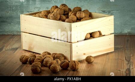 Walnuts in a vintage wooden box. Natural food Stock Photo - Alamy