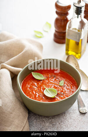 Tomato basil soup with olive oil in a bowl Stock Photo - Alamy