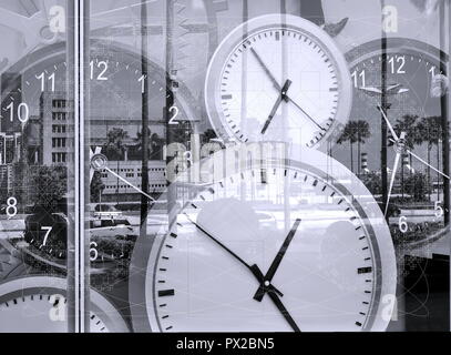 Large clocks reflecting in shop window illustrate the concept of time ...