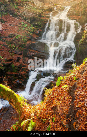 Giant waterfall from above with view down river and of forest Stock ...