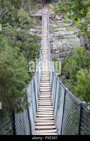 Metal bridge over a rock gorge at Voringfossen waterfall, Eidfjord ...