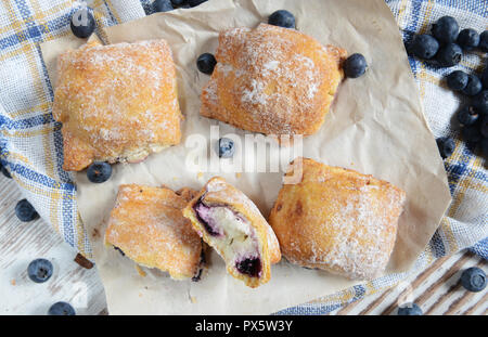 Stuffed homemade cookies with whipped cream and blueberries Stock Photo ...
