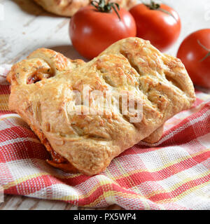 Crusty rolls stuffed with tomatoes and cheese Stock Photo - Alamy