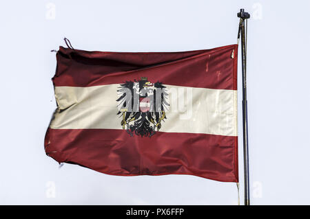 Austrian flag with biheaded eagle emblem Stock Photo - Alamy