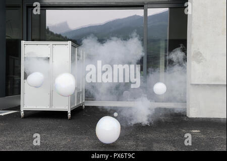 Switzerland, Wallis, artificial white air bubbles from bubble machine ...