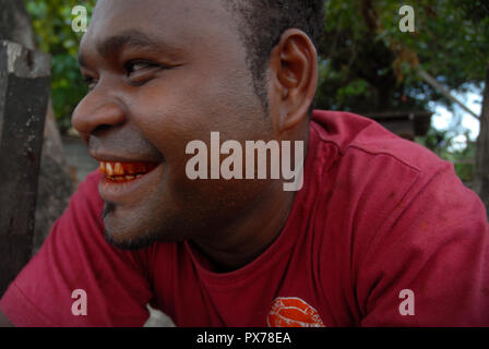 Man with red teeth after chewing betel nuts, Honiara, Solomon Islands ...