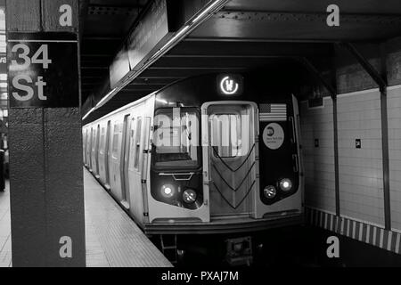 NYC Subway Trains approaching and leaving a subway station Stock Photo ...