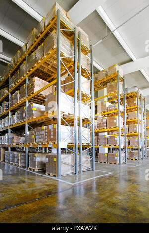 Distribution center warehouse storage inside shelving, metal racking ...