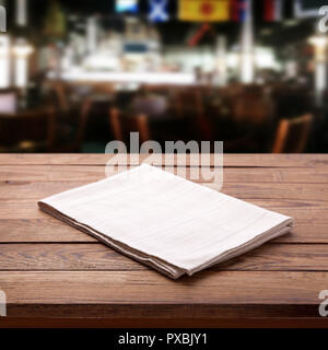 Perspective view of brown tablecloth for food on cement background ...