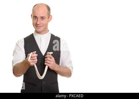 Bald Caucasian magician man holding Jack of Diamonds card Stock Photo ...