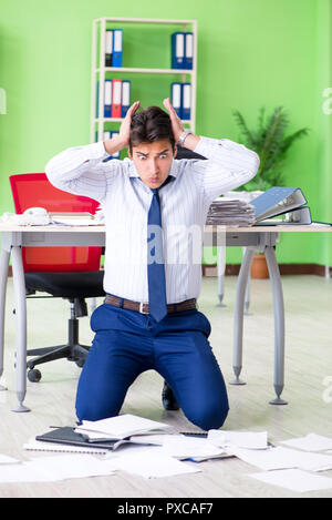 The frustrated businessman stressed from excessive work Stock Photo - Alamy