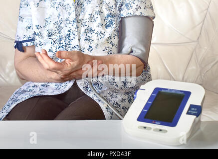 sphygmomanometer blood pressure device retiree health control Stock ...