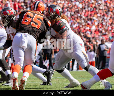 Tampa Bay Buccaneers center Ryan Jensen (66) snaps the ball during a ...