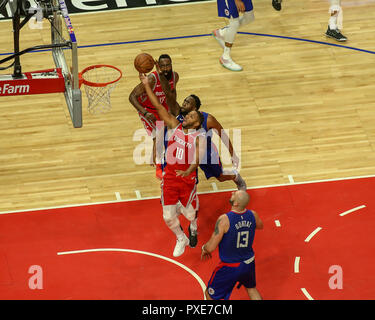Houston Rockets guard Eric Gordon, right, pulls in a rebound as Denver ...