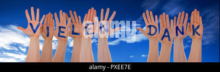 Many Hands Building Vielen Dank Means Thank You, Blue Sky Stock Photo ...
