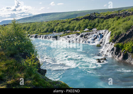Hraunfossar lava falls in Iceland, where water comes out of the porous ...