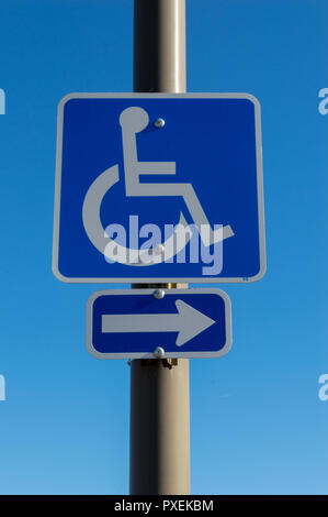 Handicap Sign with Arrow Stock Photo - Alamy
