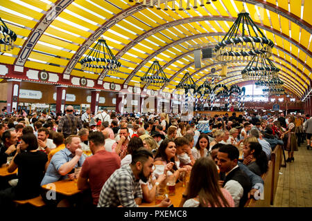 Crowd of people in Lowenbrau tent in Munich city, Germany Stock Photo ...
